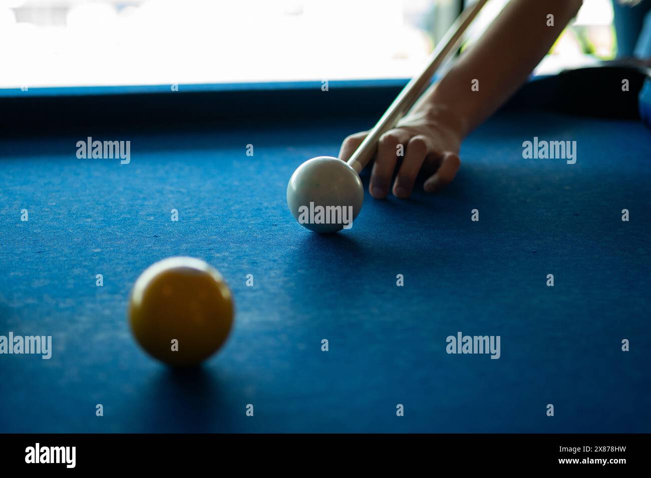 Playing Billiards on a Blue Felt Table Stock Photo - Alamy