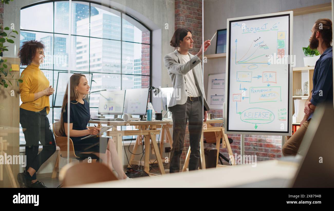 Stylish Young Project Manager Talking on a Team Meeting in Creative ...