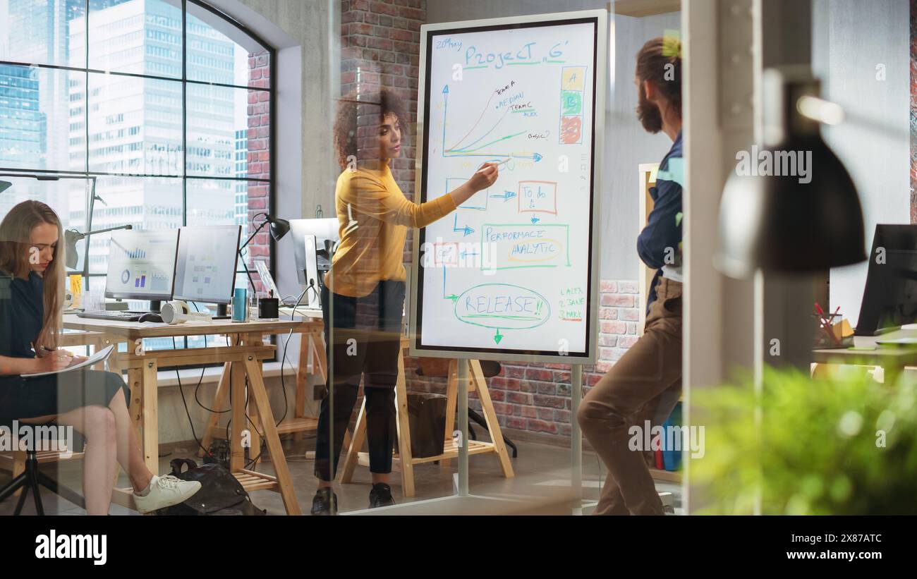Driven Visionary Businesswoman Leading a Team Meeting in Creative ...