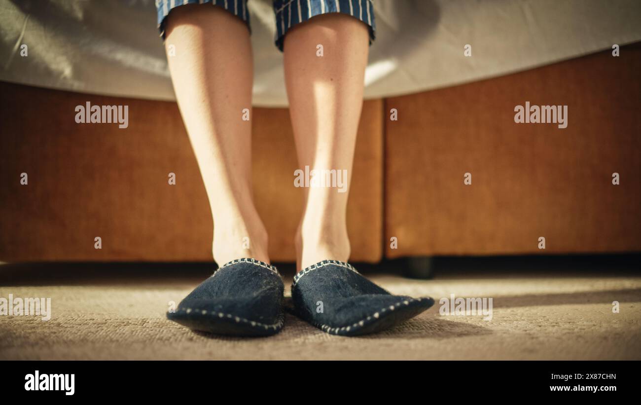 Person Waking Up and Stepping into Cozy Slippers. Ready to go about ...