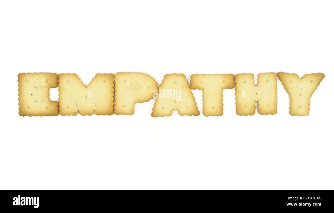 Capital letter shaped biscuits forming word EMPATHY isolated on white ...