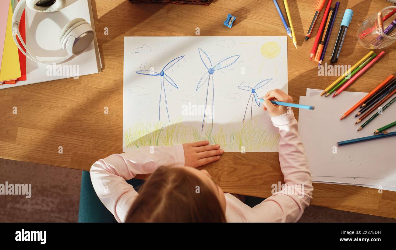 Top View: Little Girl Drawing Beautiful Wind Turbines that Look Like ...