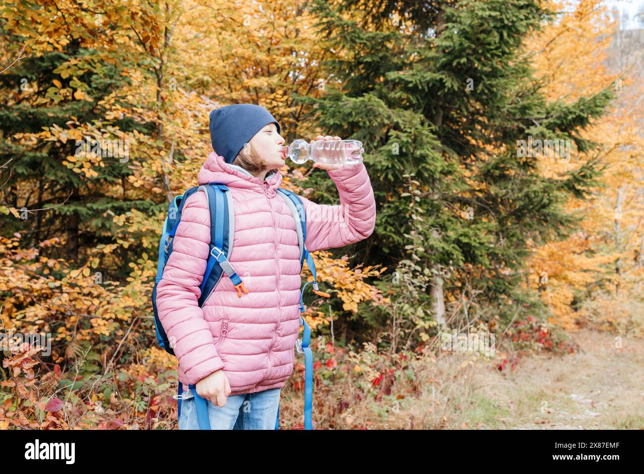 Tourist backpack drinking water from hi-res stock photography and ...