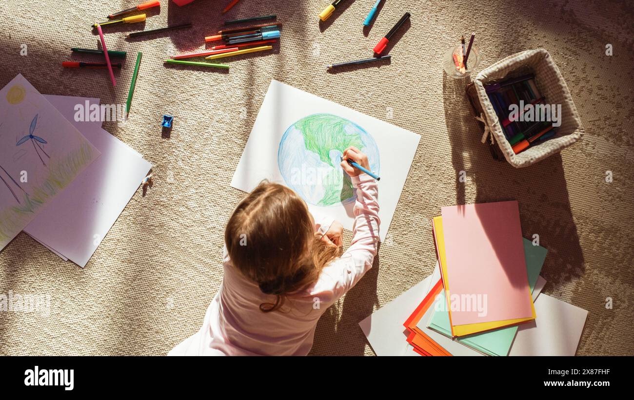 Top View: Little Girl Drawing Our Beautiful Green Planet Earth. Child ...