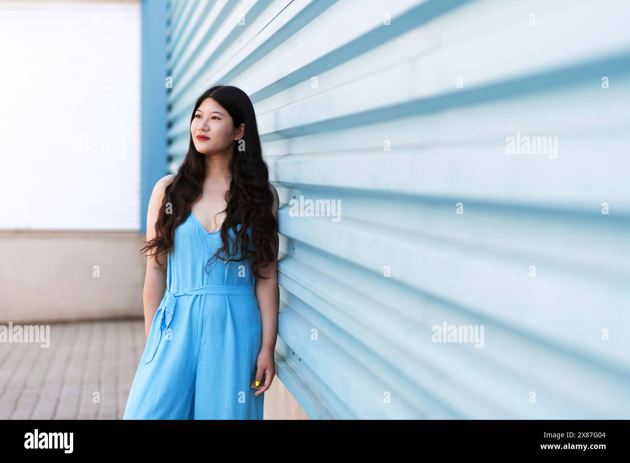 Asian woman in blue dress hi-res stock photography and images - Alamy