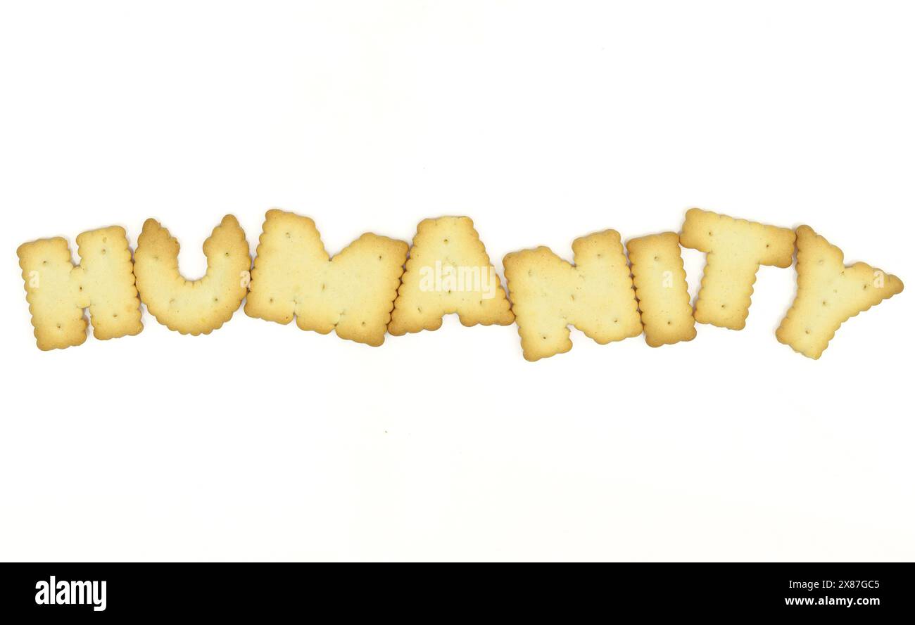 Capital letter shaped biscuits forming word HUMANITY isolated on white ...