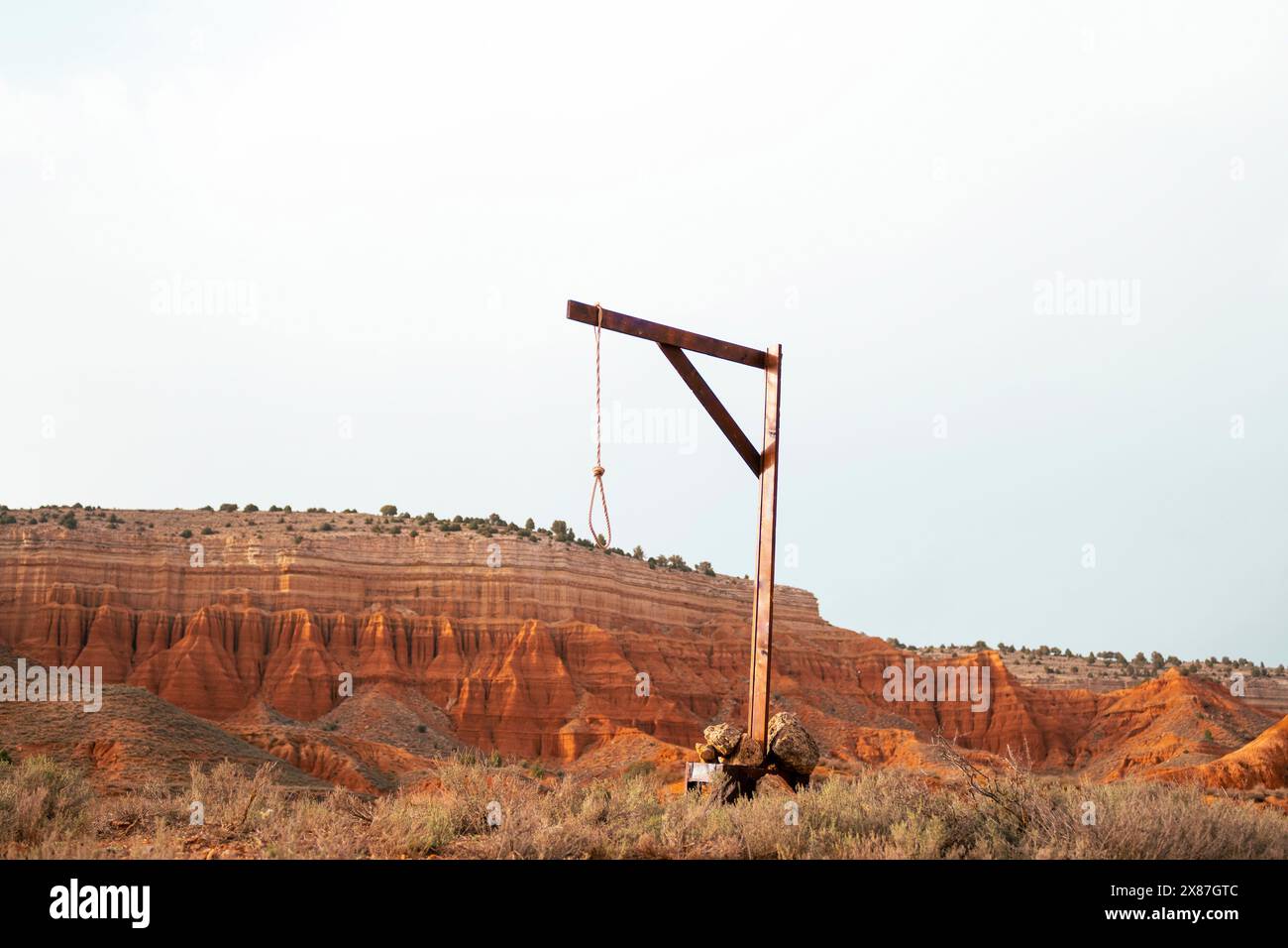 Noose hanging from pole amidst plants at red canyon Stock Photo - Alamy