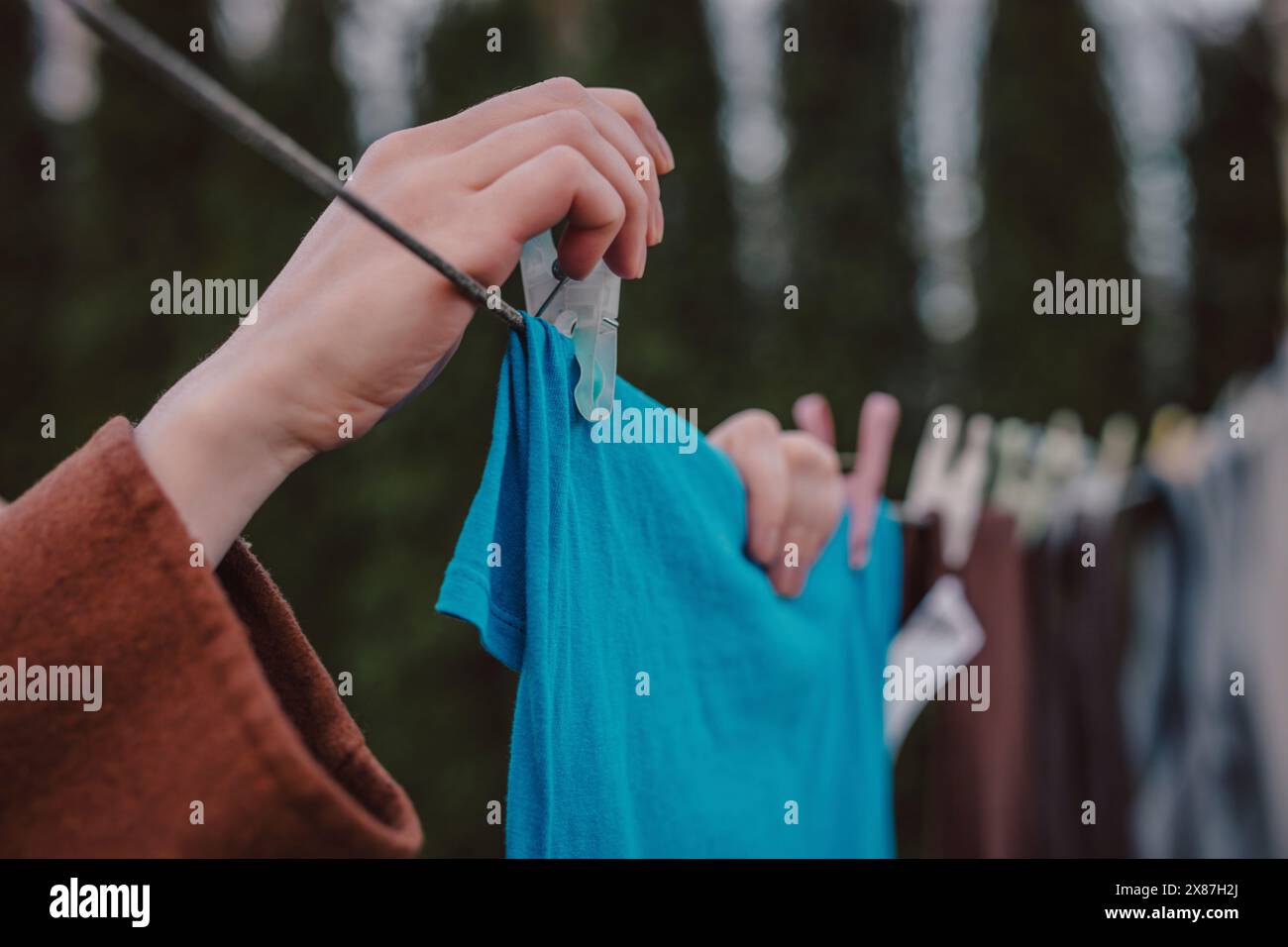 Putting his clothes on hi-res stock photography and images - Alamy