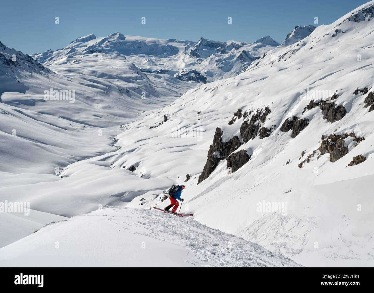 Skier skiing on Pointe de Mean Martin mountain in Vanoise National Park ...