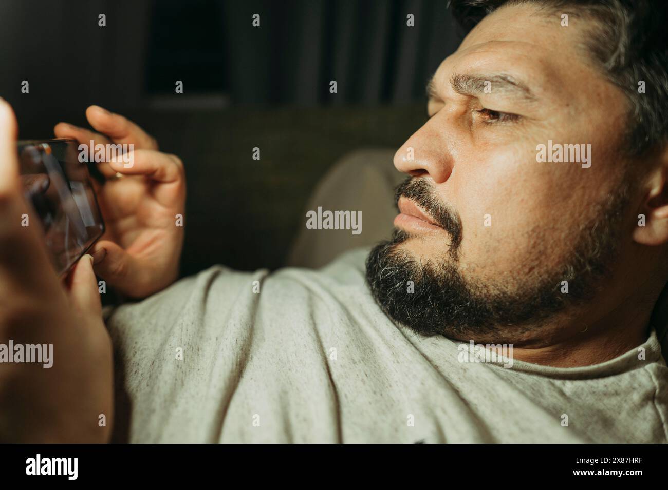 Man playing games on mobile hi-res stock photography and images - Alamy