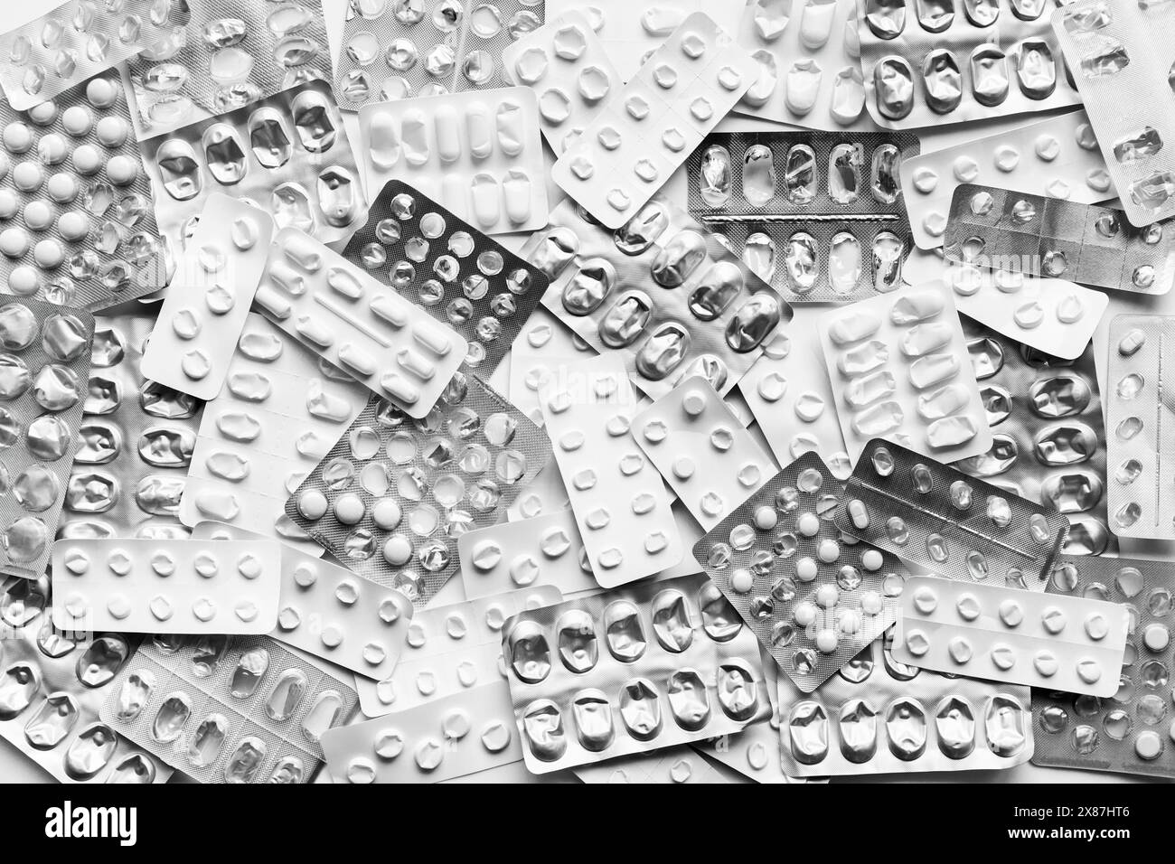 Full and empty medicine blister packs Stock Photo - Alamy