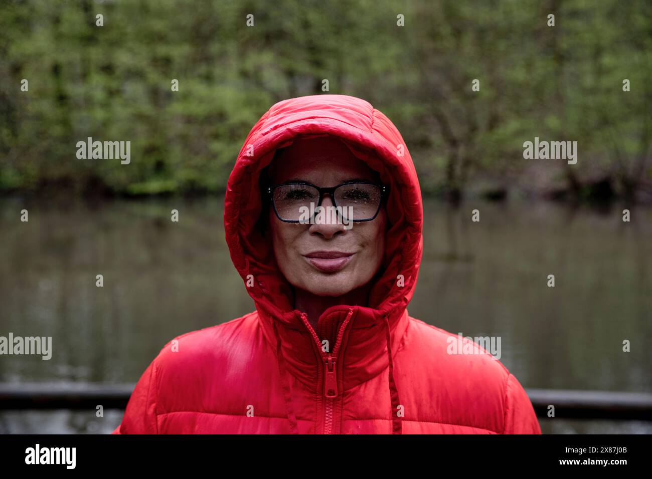 Wet woman red coat hi-res stock photography and images - Alamy