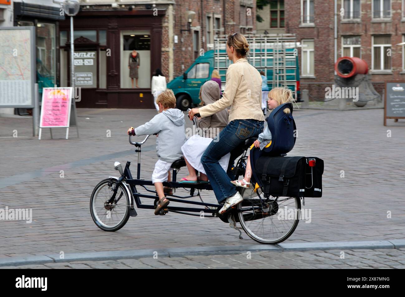 Belgium, Flanders, Ghent, Mother and Children on Bicycle Stock Photo ...