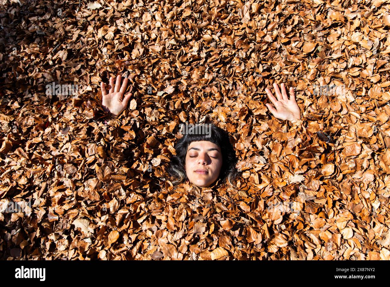 Woman covering eyes from sunlight hi-res stock photography and images ...