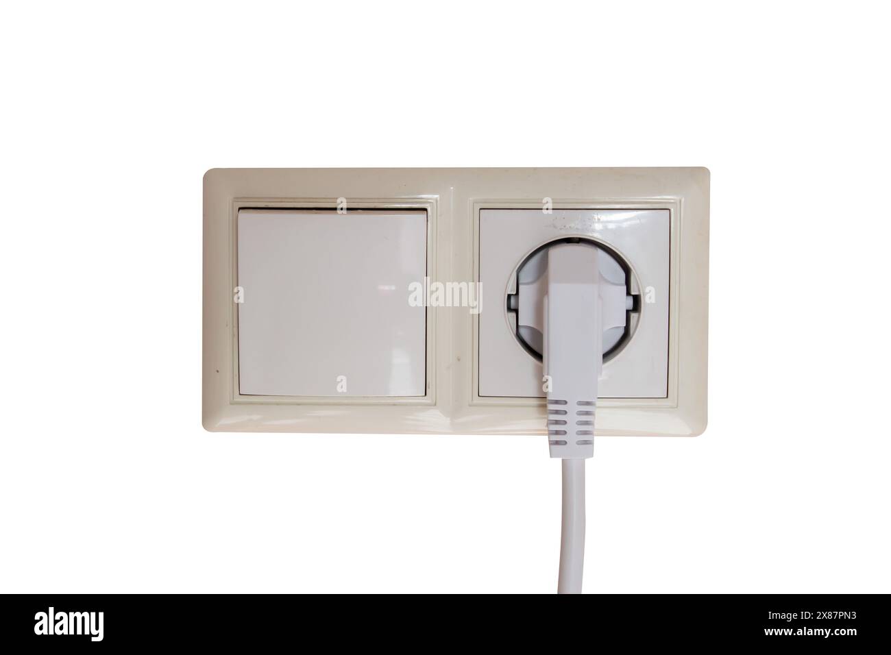 A plug in socket isolated on white background Stock Photo - Alamy
