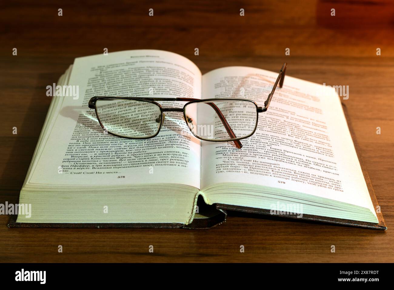 Book lying on the table hi-res stock photography and images - Alamy