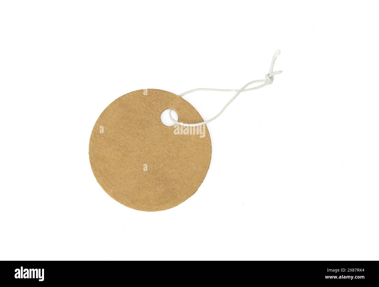 Round brown paper tag with string isolated on white background. Blank ...