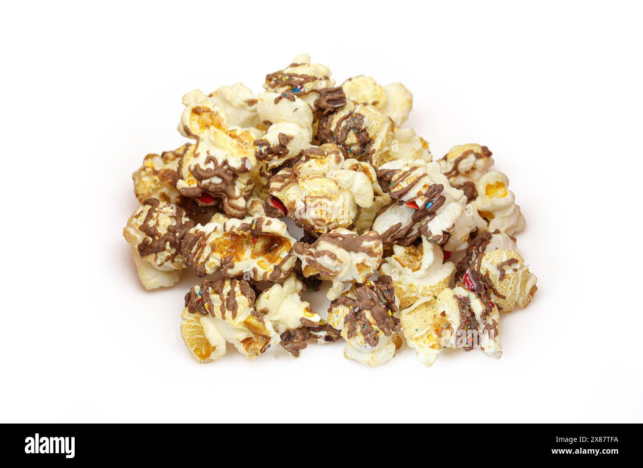 Pile of chocolate covered candy popcorn isolated on white background ...