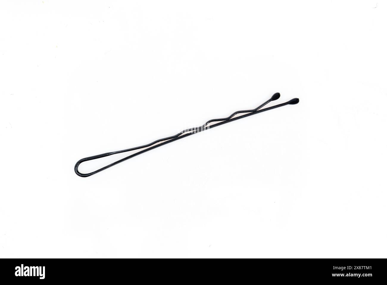Single bobby pin isolated on white background. Simple hairpin hairstyle ...