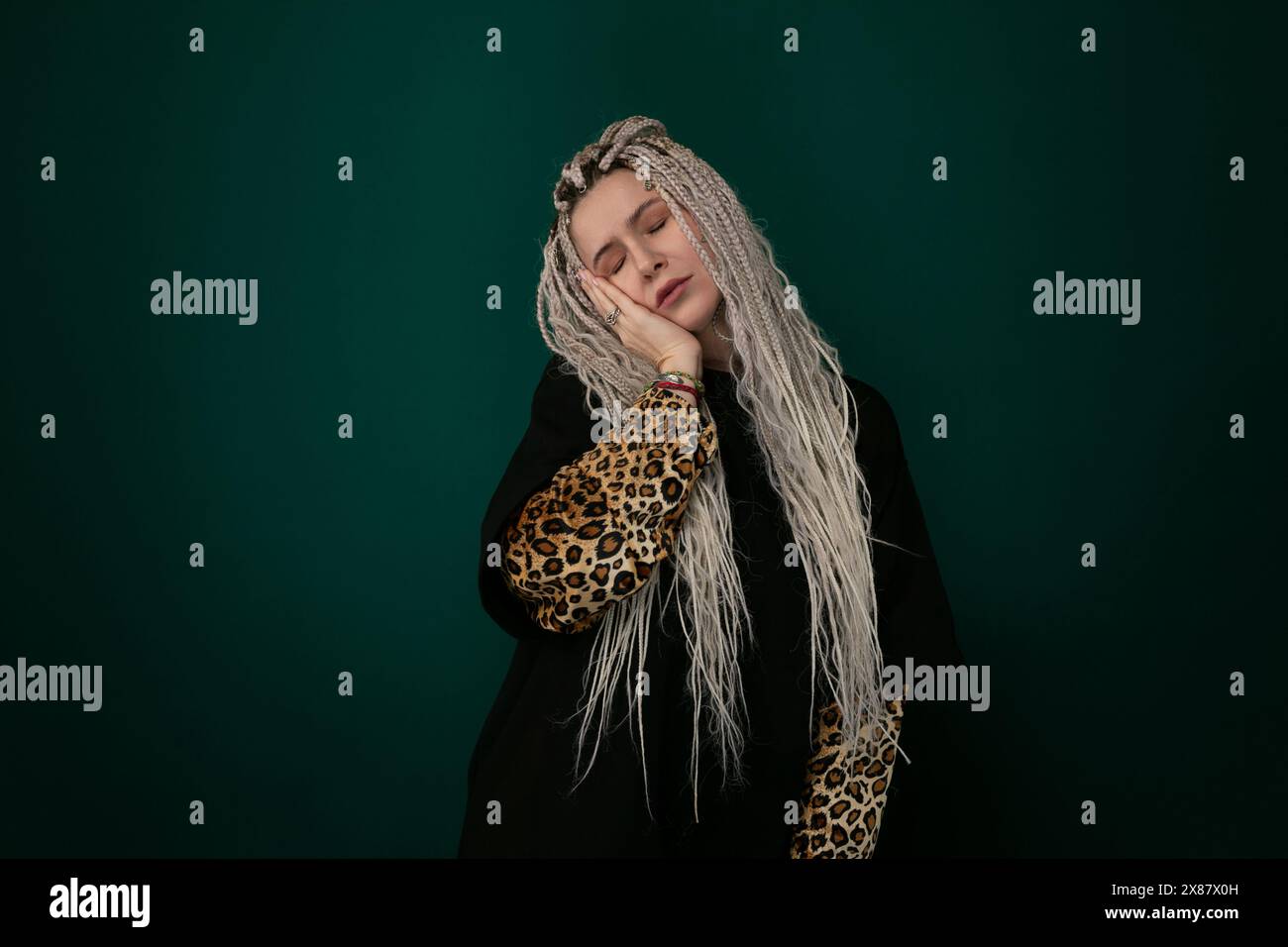 Woman in leopard print shirt hi-res stock photography and images - Alamy