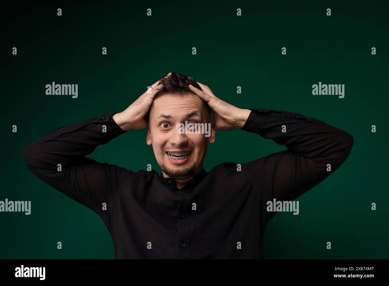 Man Holding Head in Distress Stock Photo - Alamy