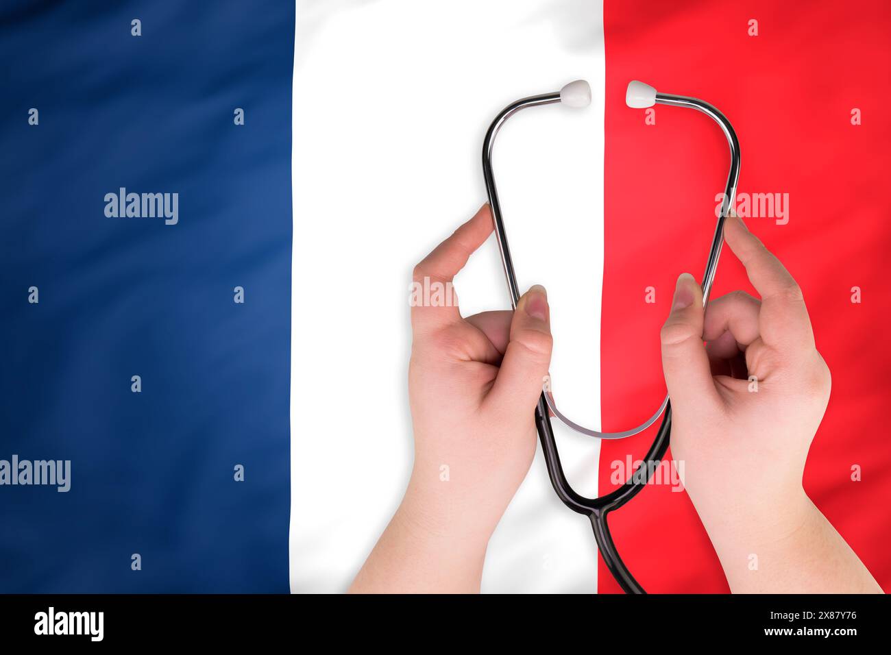 Medical stethoscope in hands (close-up) against the background of the ...