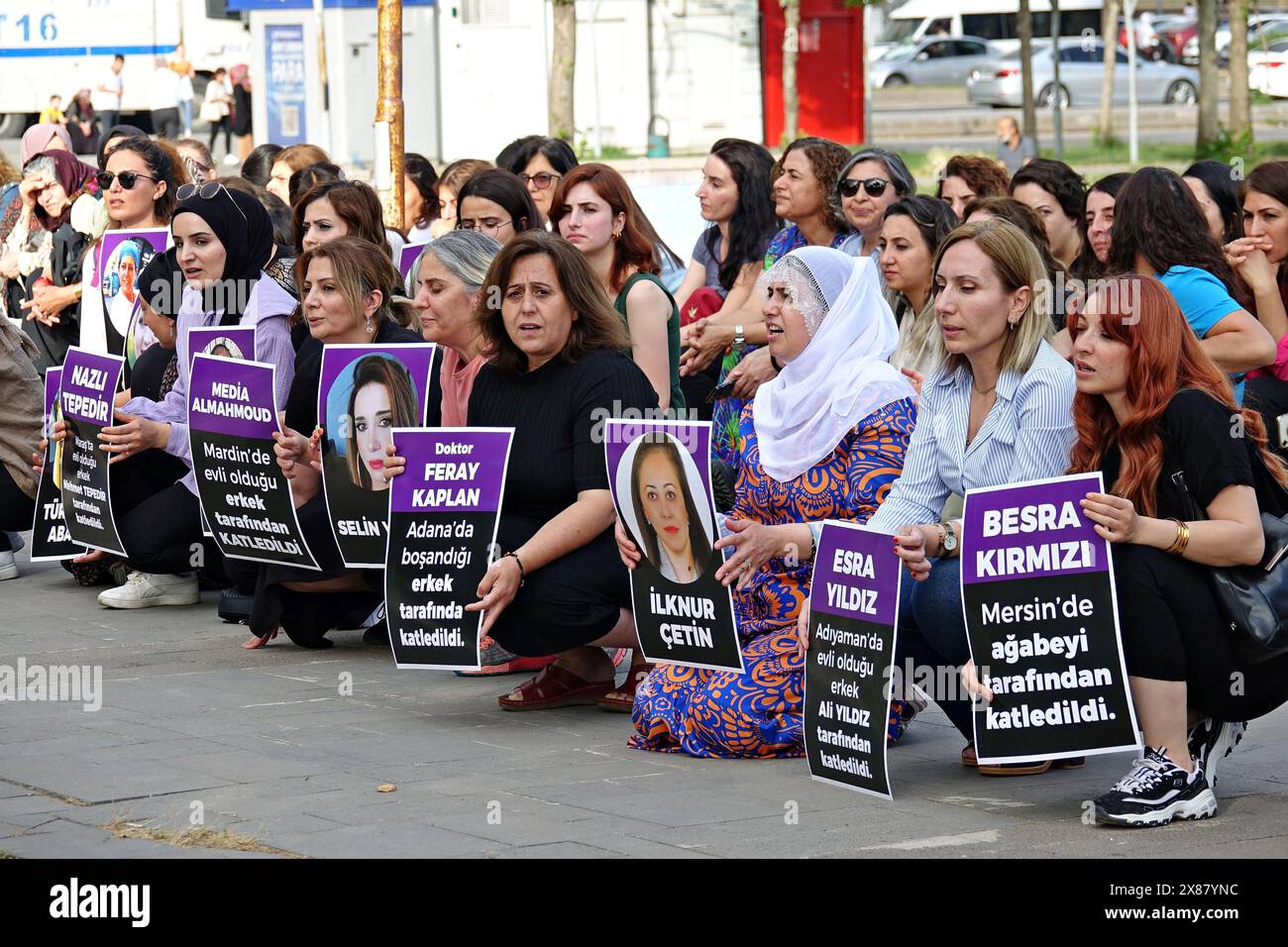 A group of women are seen holding placards participating in the ...