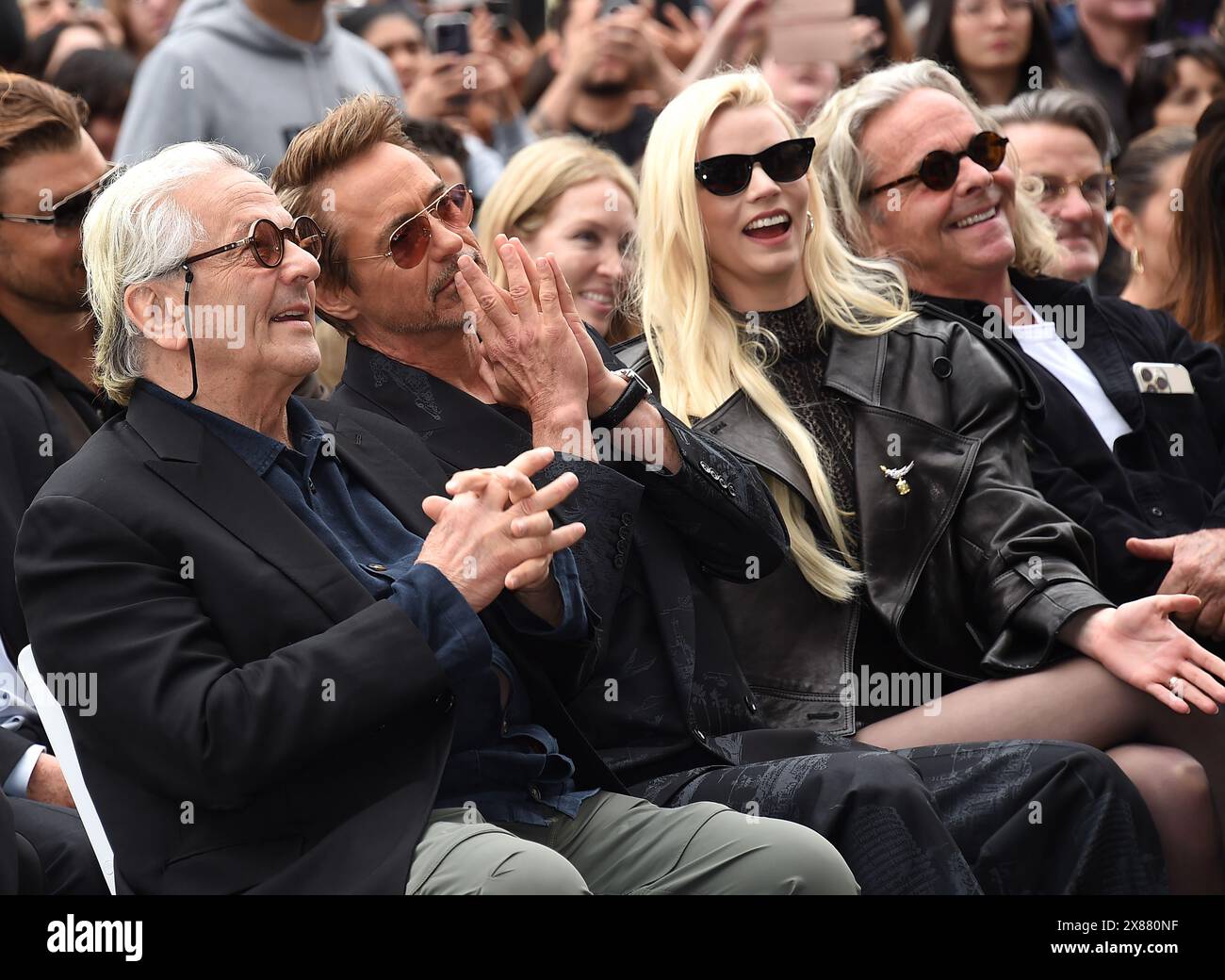 Hollywood, USA. 23rd May, 2024. George Miller, Robert Downey Jr. and ...