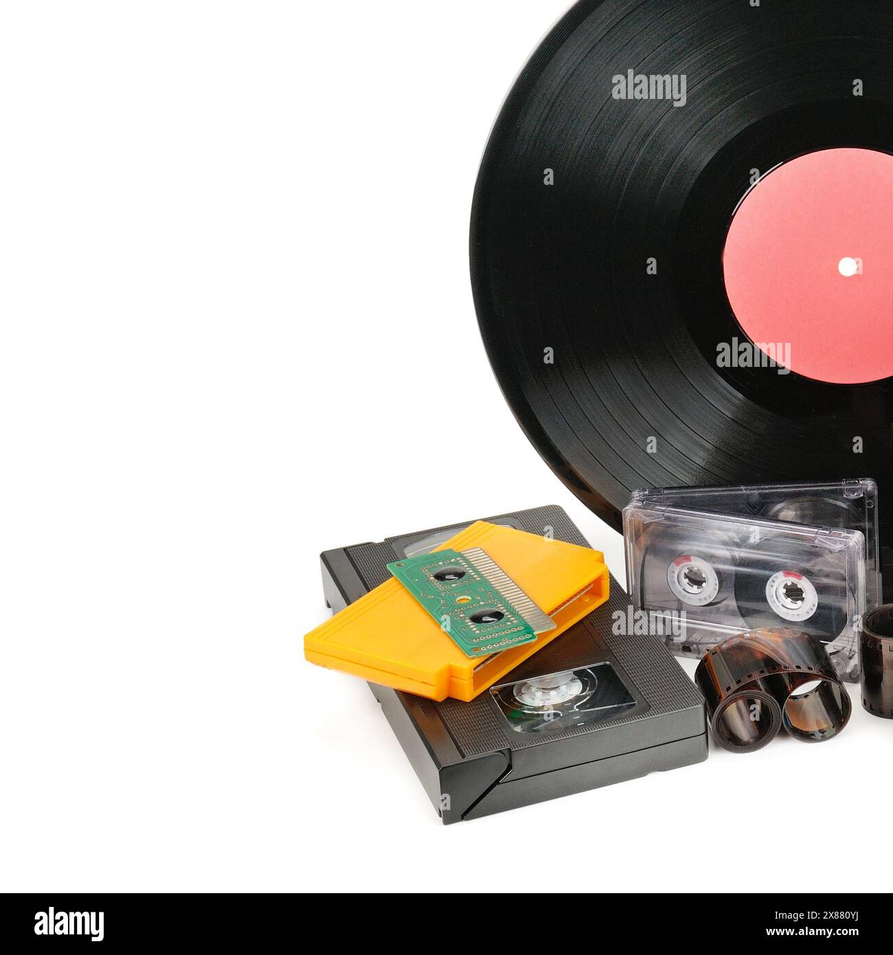 Vinyl record, video and audio cassettes isolated on white background ...