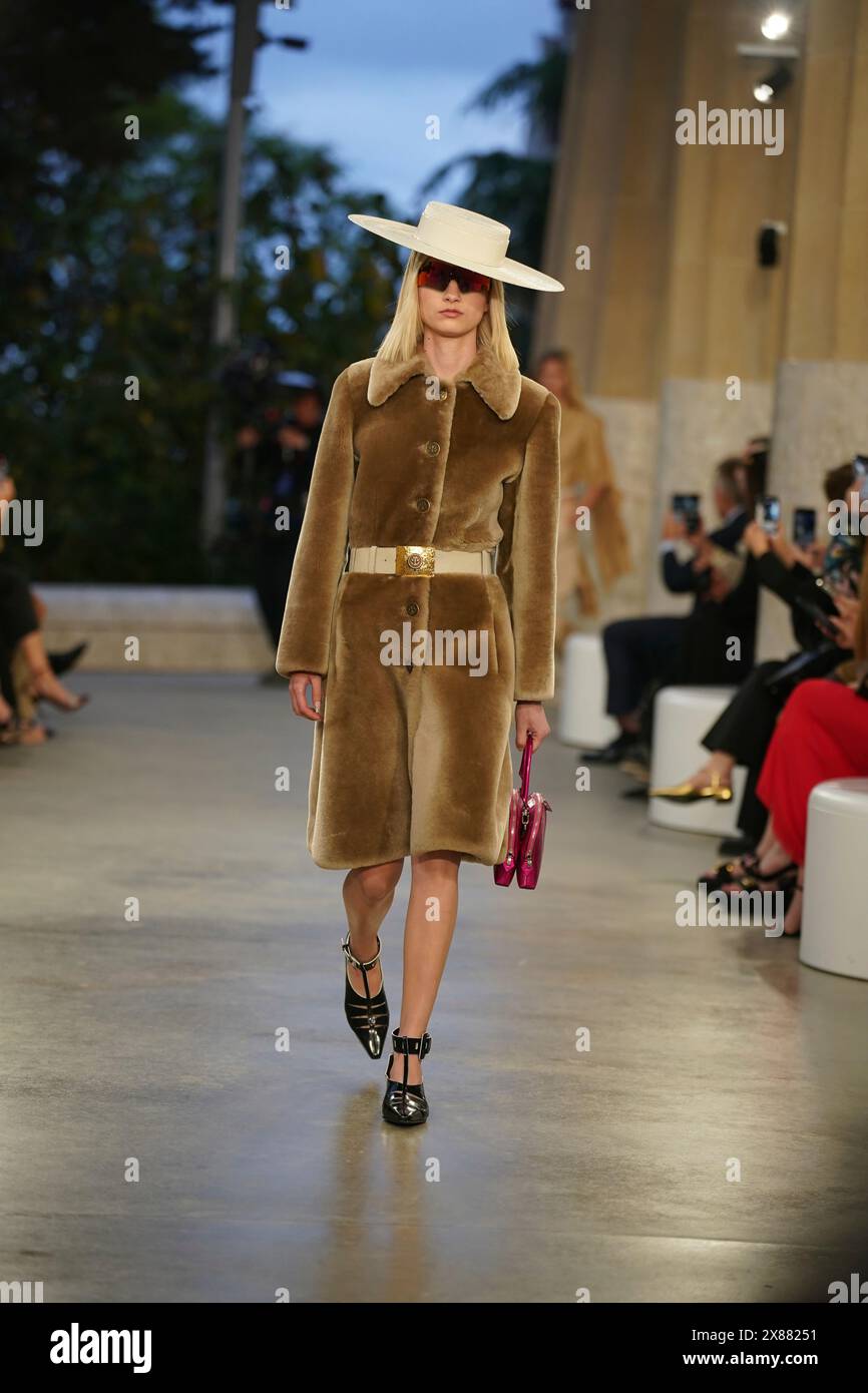 A model wears a creation by Louis Vuitton during a fashion show for the ...