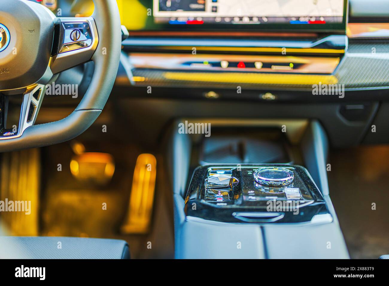 Rear view of the BMW i5 M electric car cabin interior with gear ...