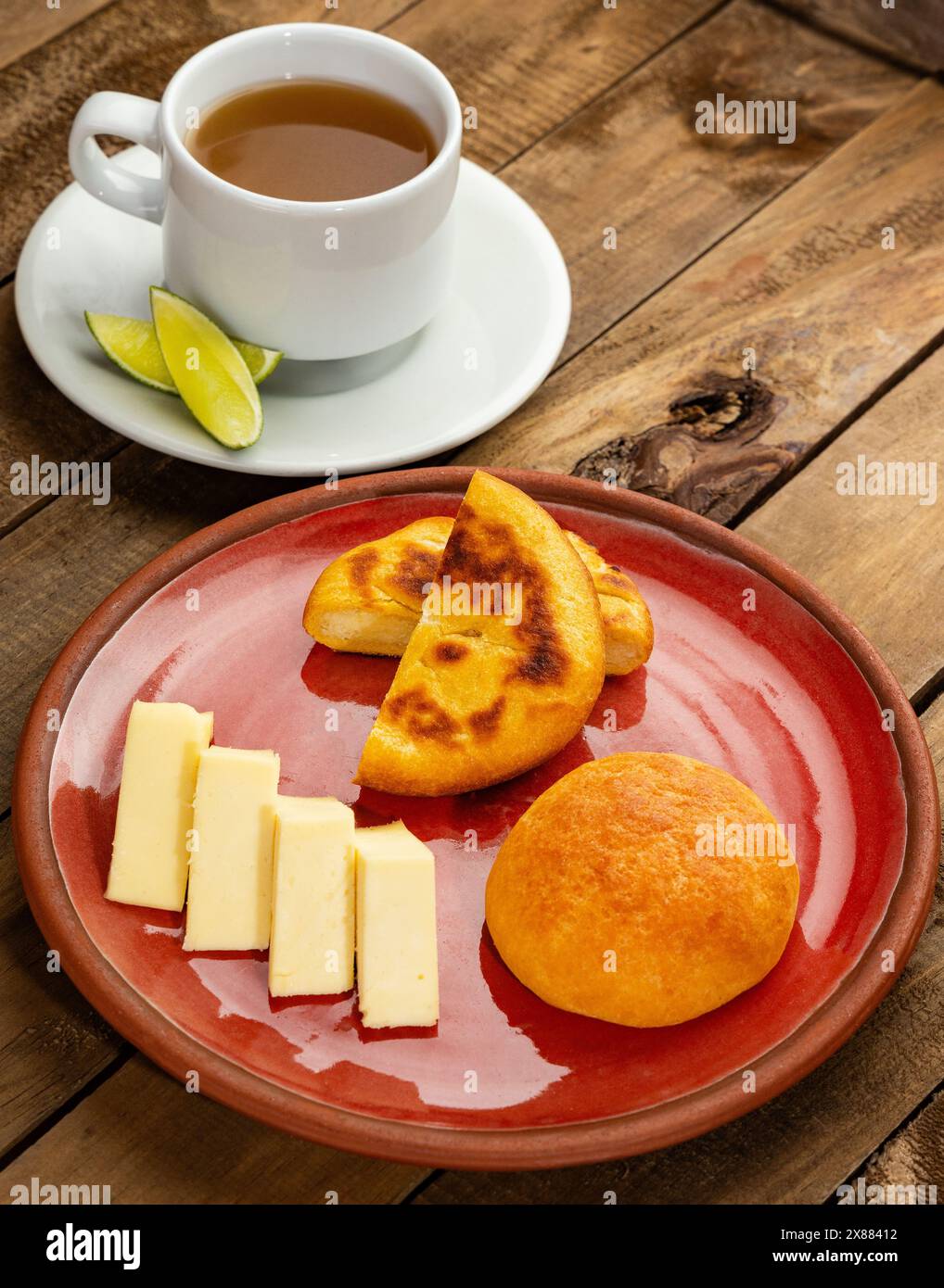 Traditional Boyacá breakfast - Arepa, almojabana, cheese and hot ...