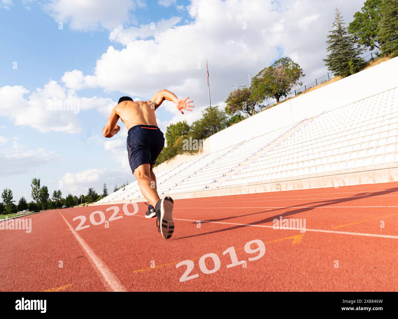 Stadium, man running and start block of athlete on a runner and arena ...
