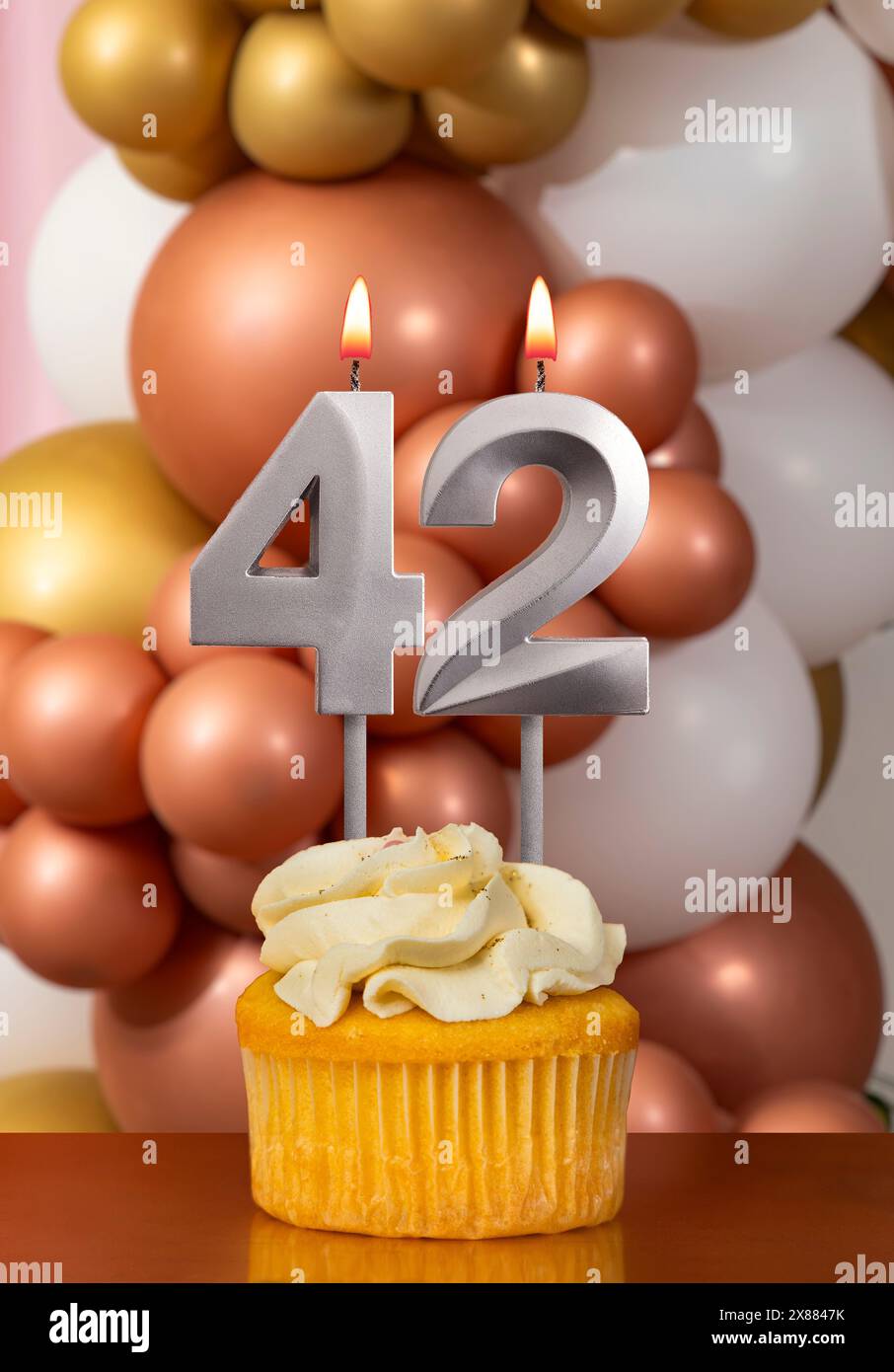 Birthday candle number 42 - Celebration balloons background Stock Photo ...