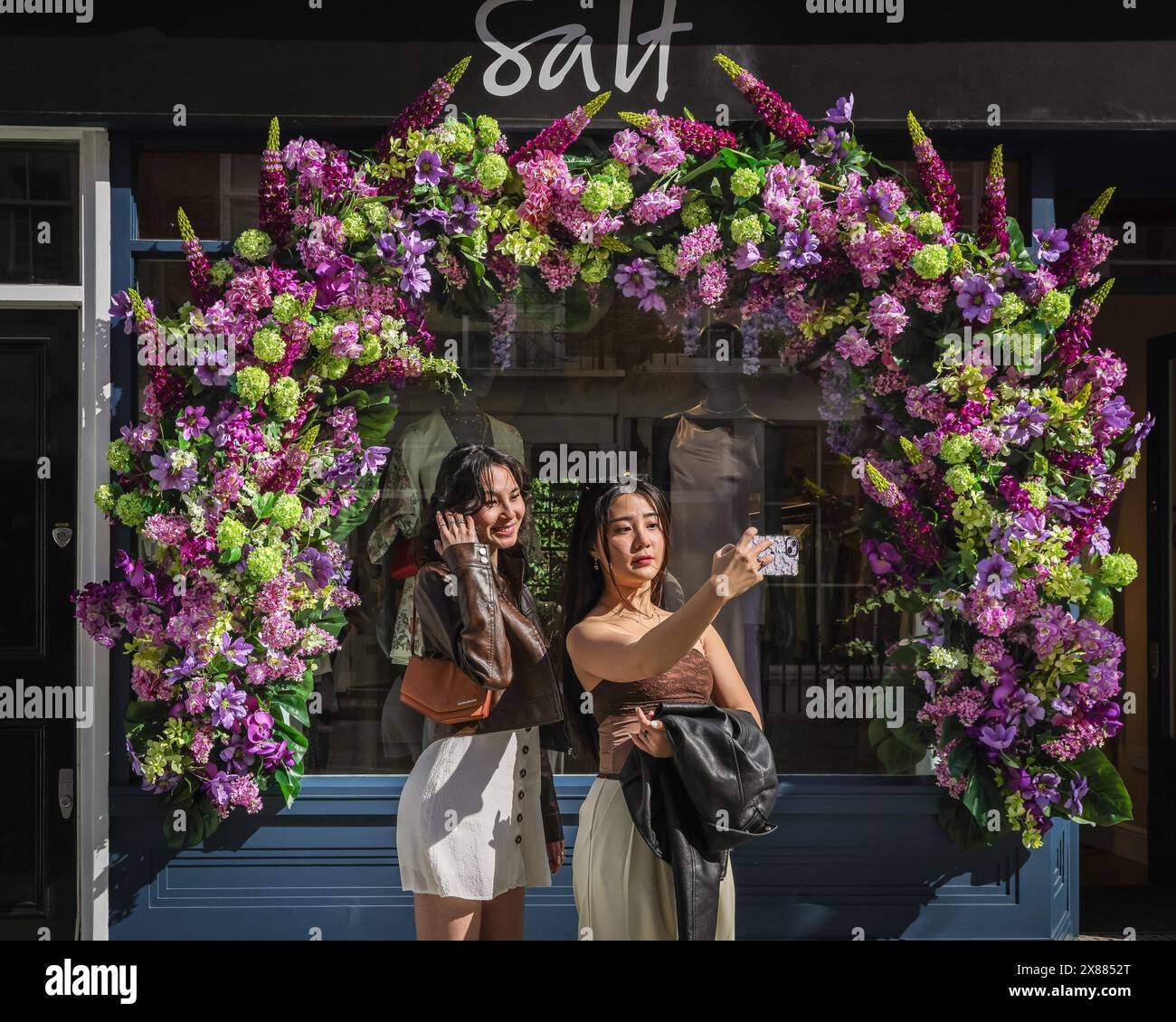 London, UK. 23rd May 2024. Two visitors take selfies with the beautiful ...