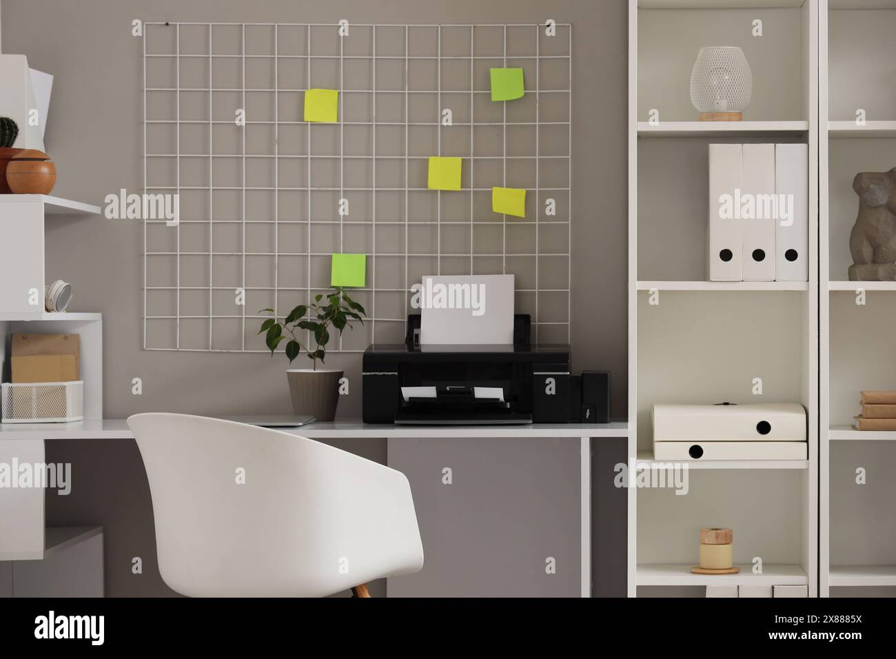 Interior of office with workplace, pin board and printer Stock Photo ...