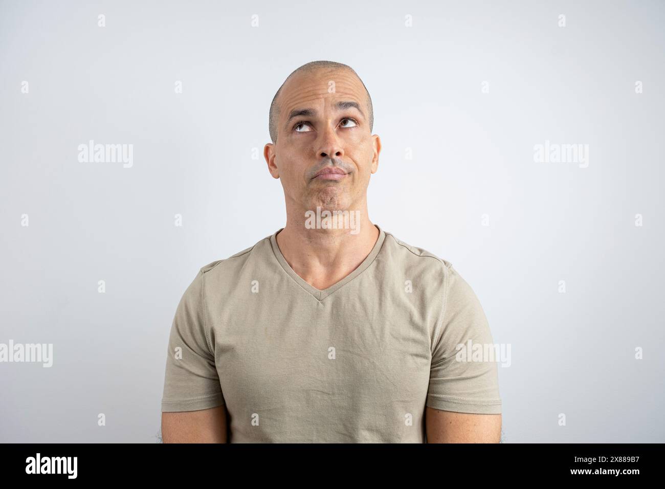 Caucasian, Brazilian man, 48 years old, in the studio showing emotions ...