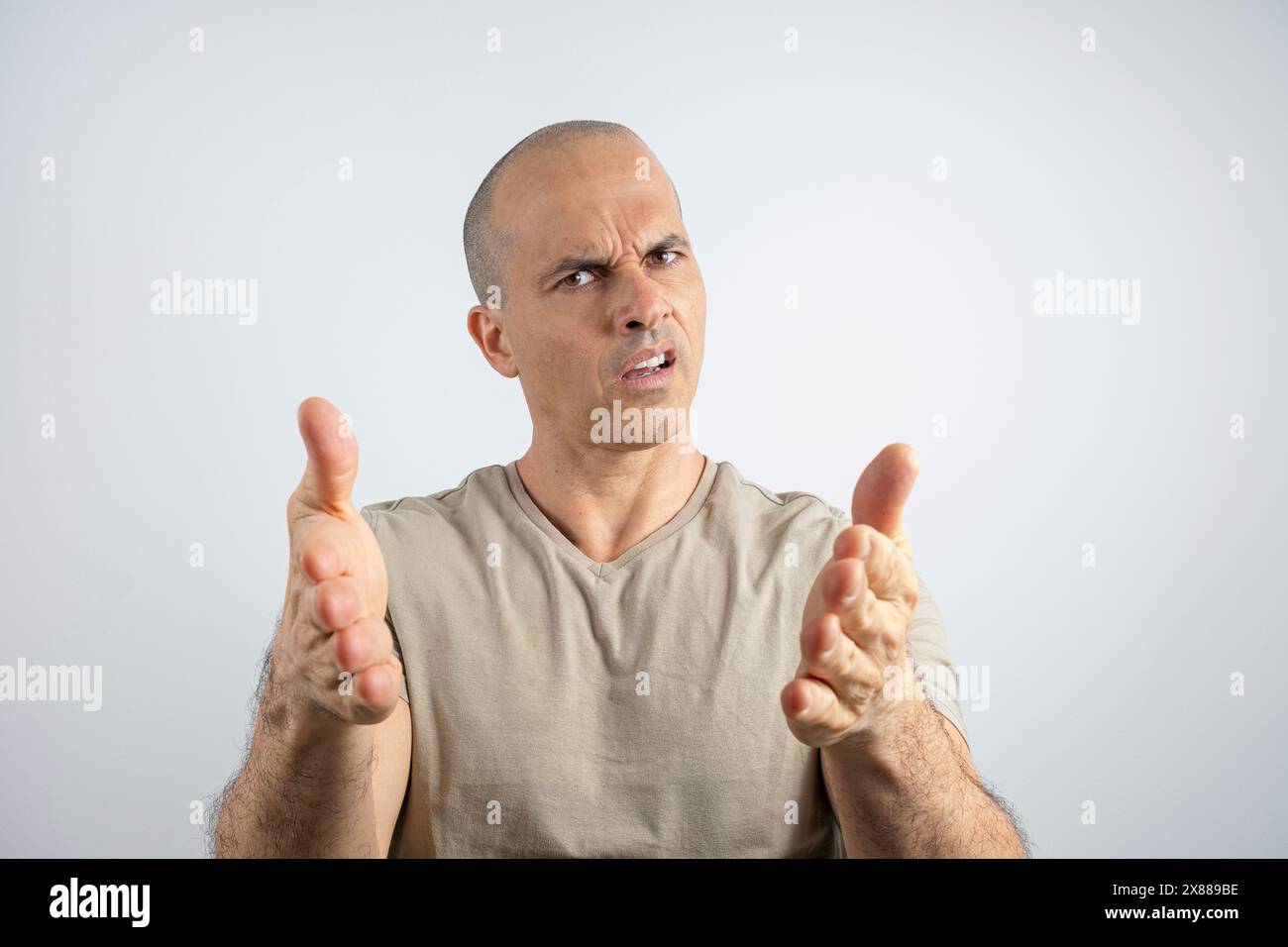 Caucasian, Brazilian man, 48 years old, in the studio showing emotions ...