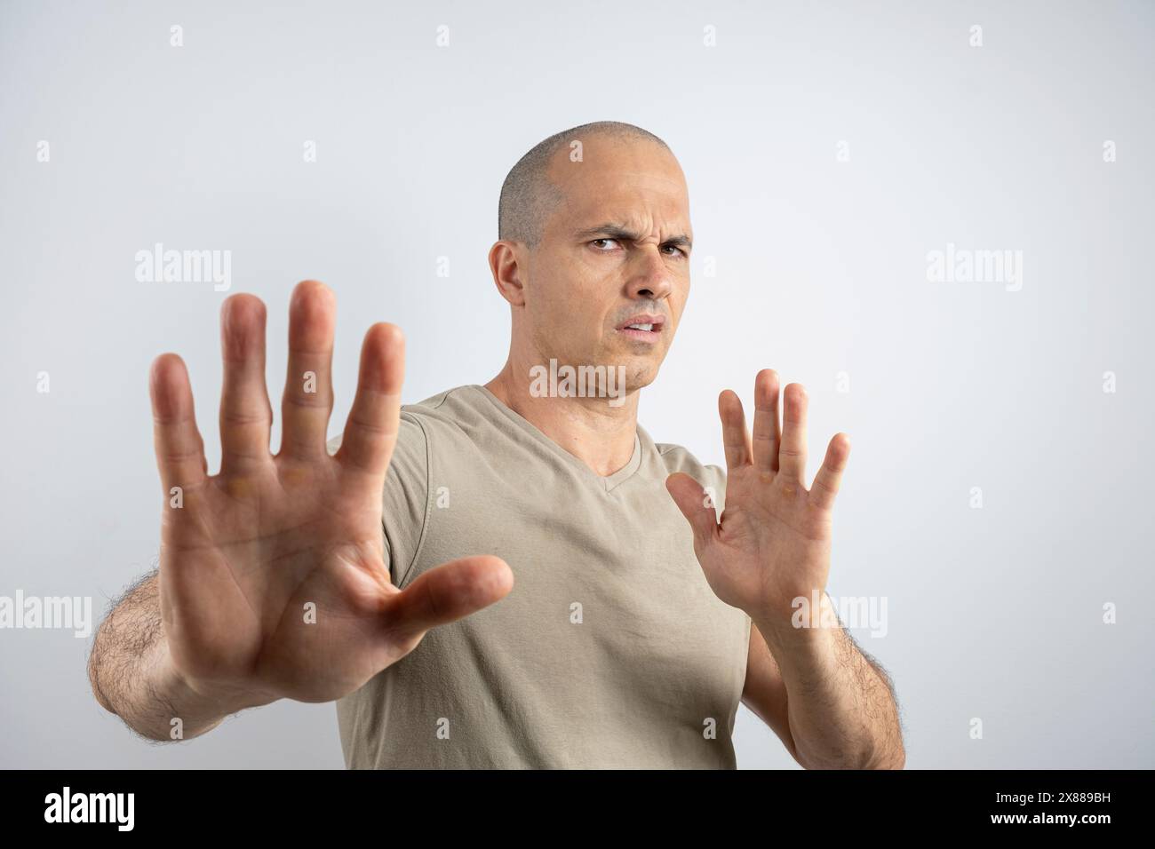 Caucasian, Brazilian man, 48 years old, in the studio showing emotions ...