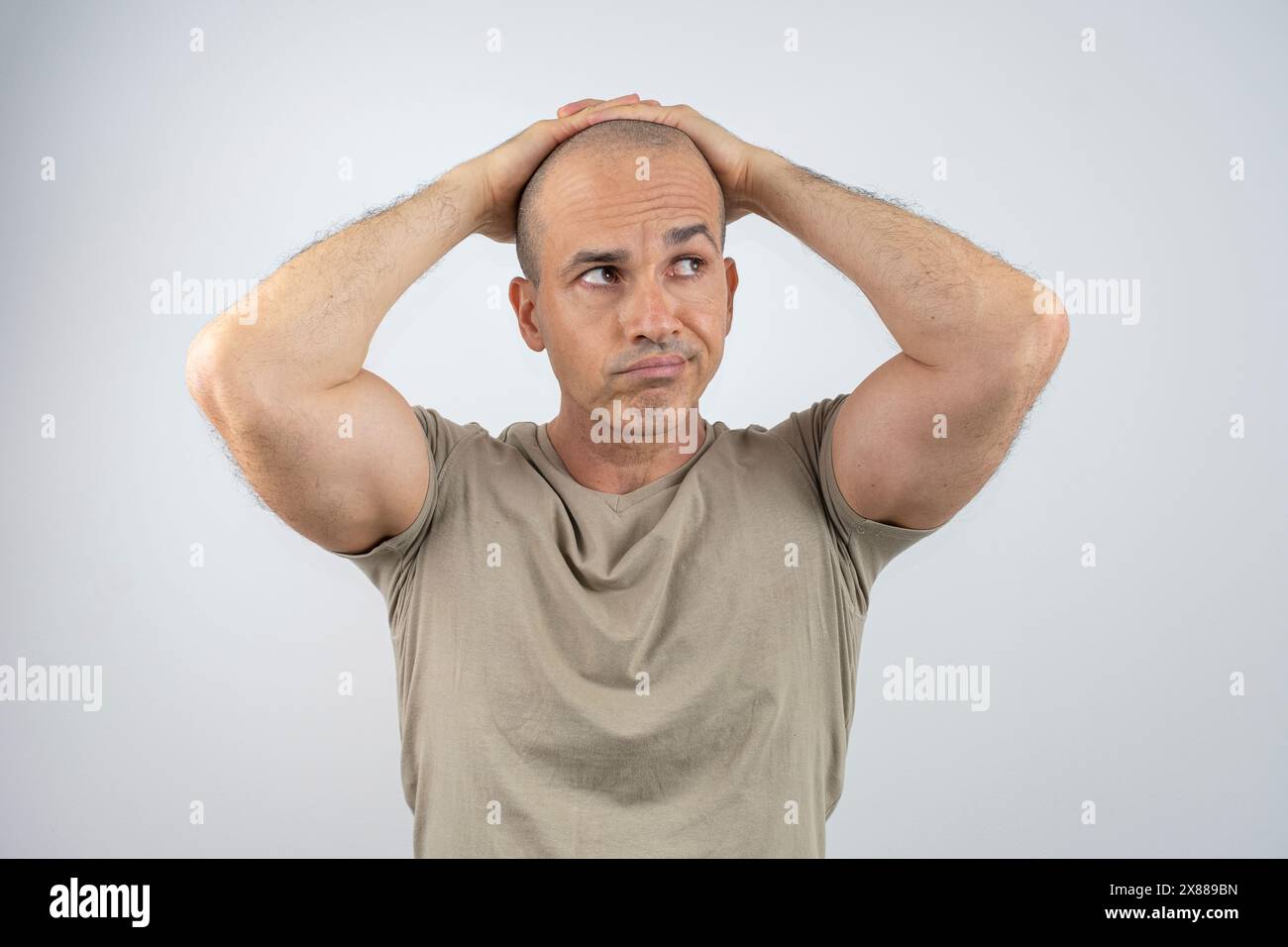 Caucasian, Brazilian man, 48 years old, in the studio showing emotions ...