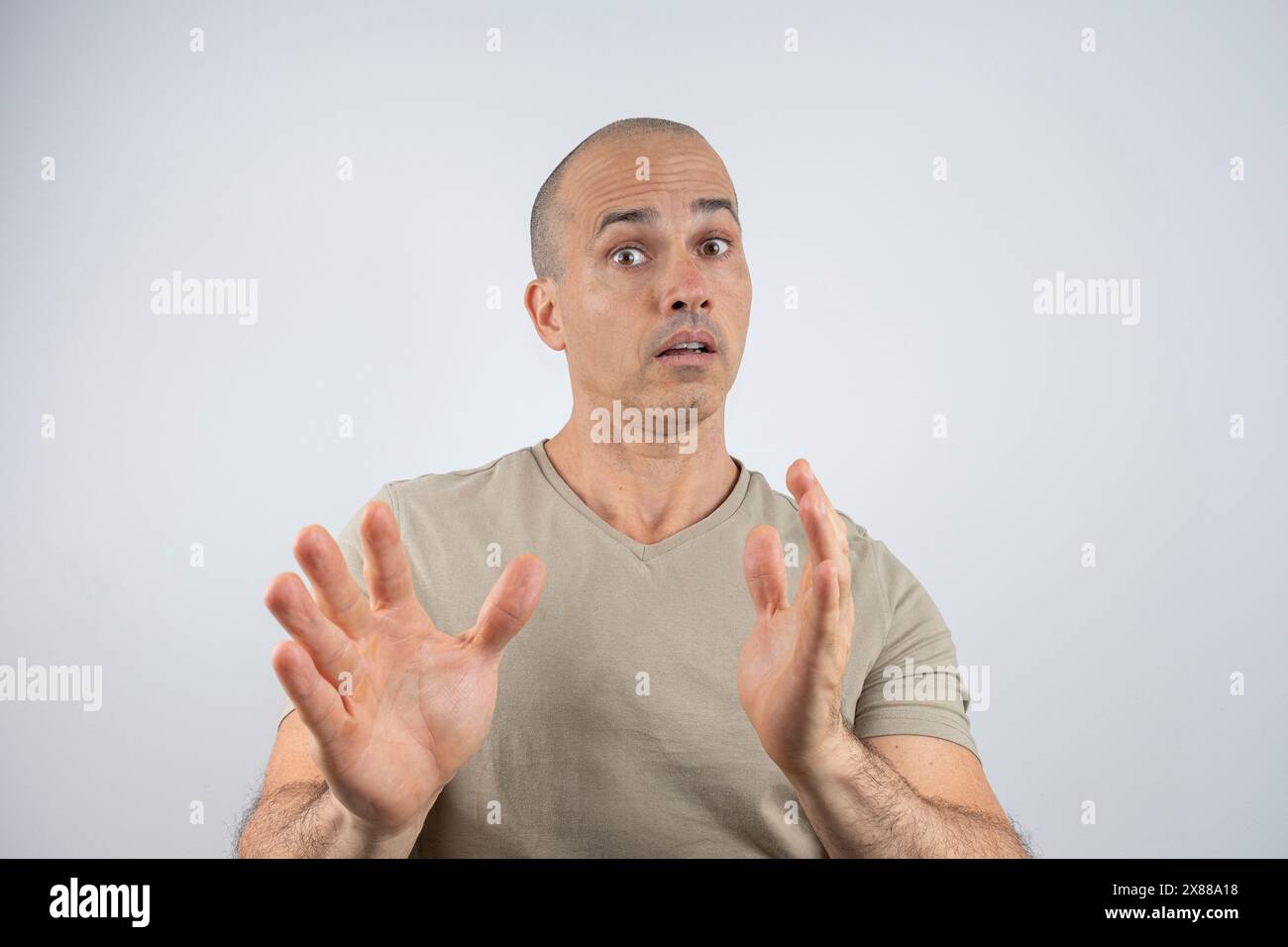 Caucasian, Brazilian man, 48 years old, in the studio showing emotions ...