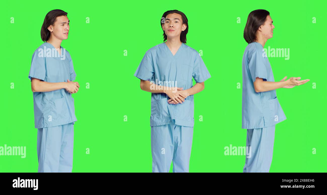 Friendly nurse waving on camera and greeting patients, standing over ...
