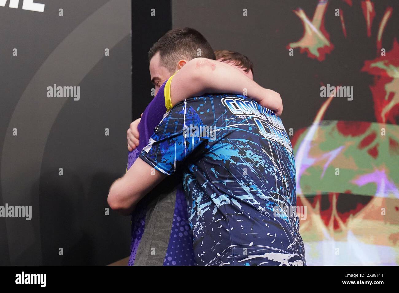 London, UK. 23rd May, 2024. Luke Littler and Luke Humphries hug and ...