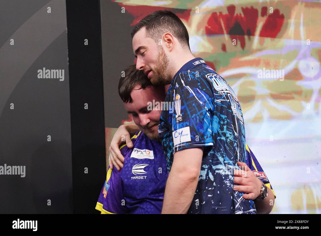 London, UK. 23rd May, 2024. Luke Littler and Luke Humphries hug during ...