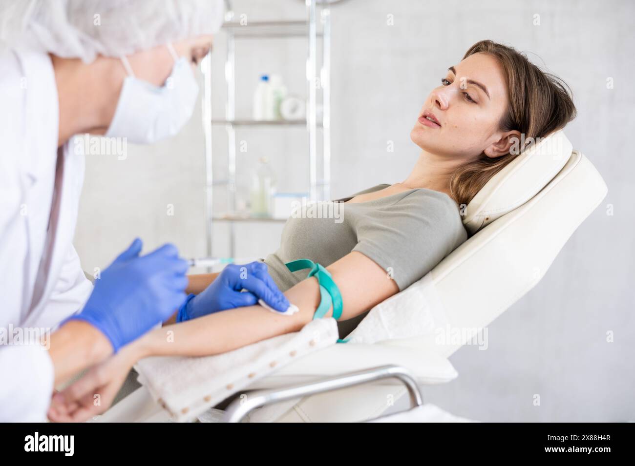 Intravenously injection young patient Stock Photo - Alamy