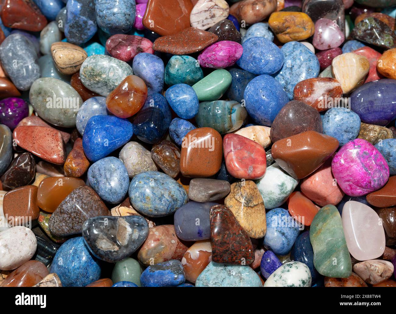 Mixed tumbled stones hi-res stock photography and images - Alamy