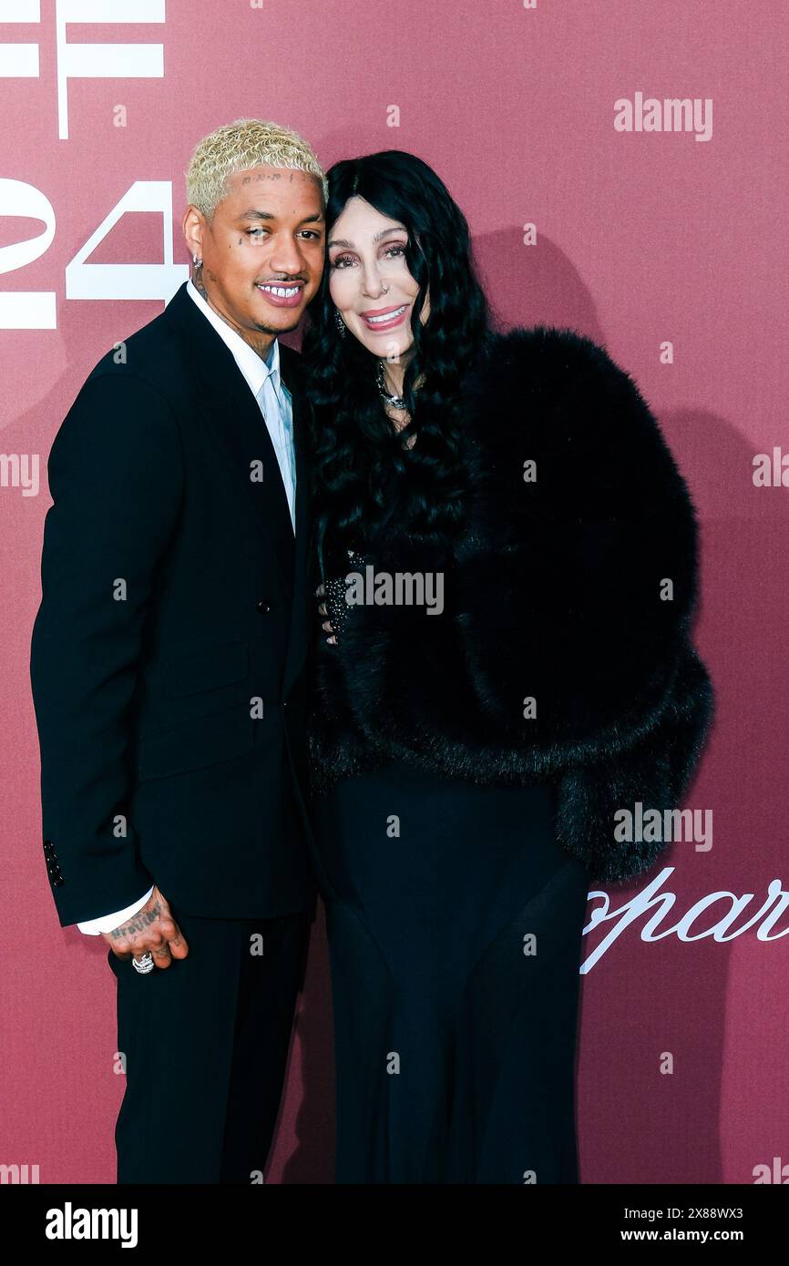 Antibes, France. 23 May 2024. Alexander 'AE' Edwards and Cher poses on ...