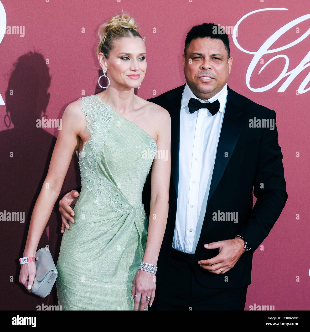 Antibes, France. 23 May 2024. Celina Locks and Ronaldo Luís Nazário de ...