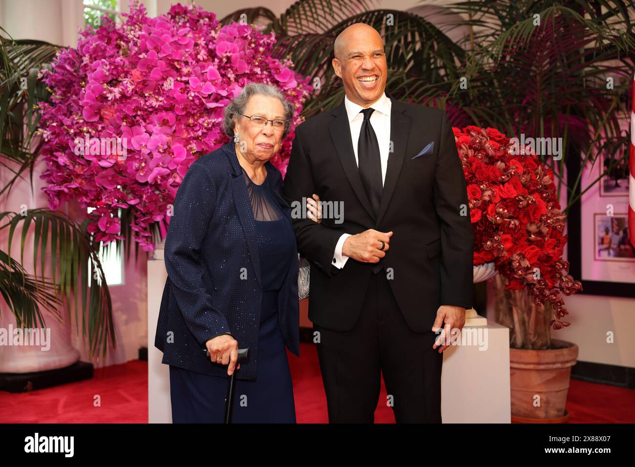 Senator Cory Booker, a Democrat from New Jersey, right, and Carolyn ...