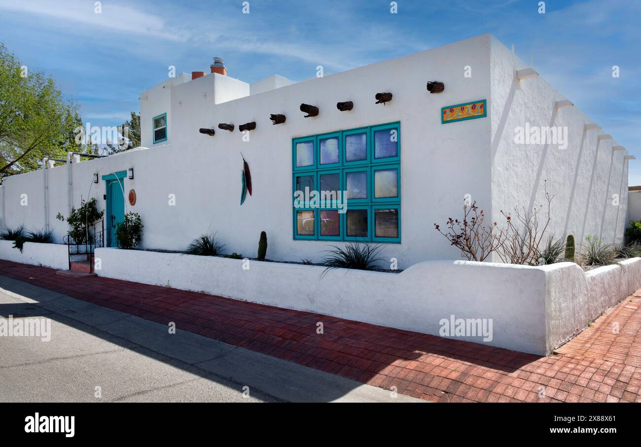 A lovely historic white adobe/stucco home in a pueblo revival style ...